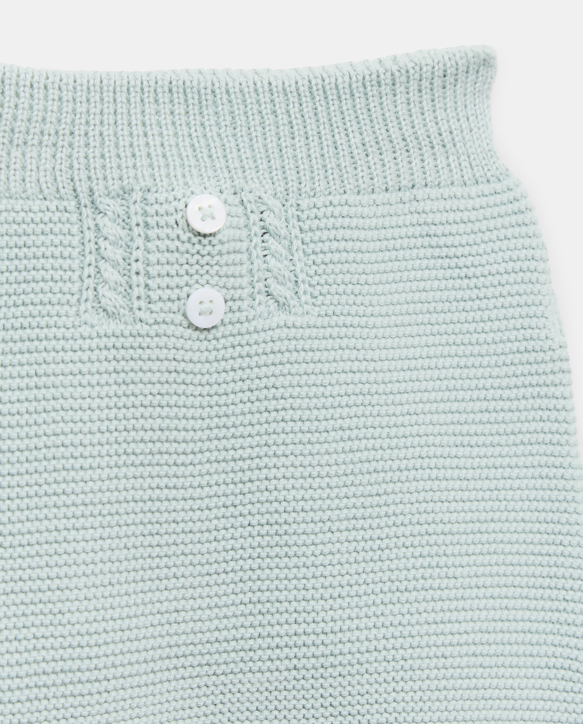 Polaina tricot fantasía ochos abiertos en frontal con botón de bebé ...